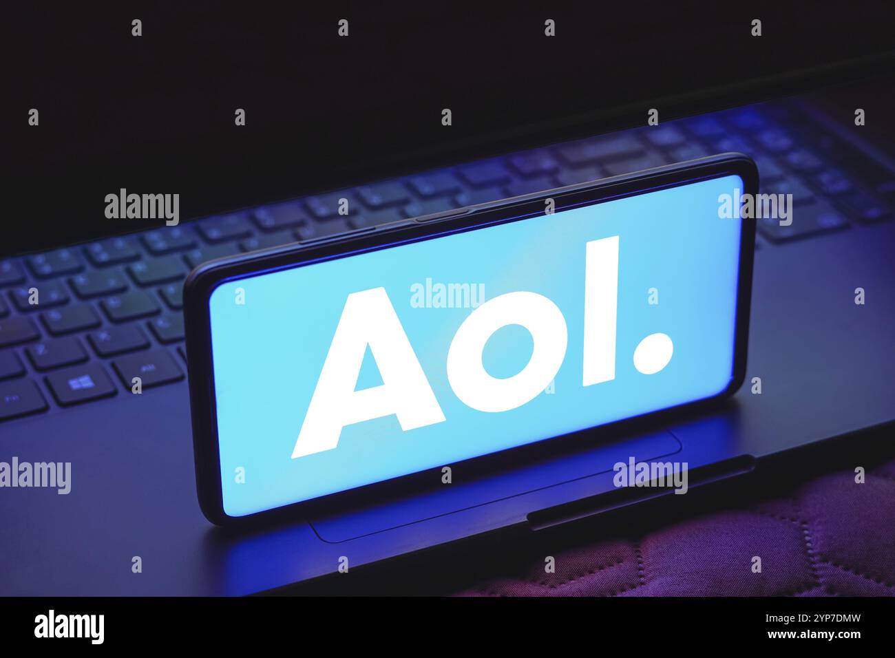 In this photo illustration, the AOL logo is displayed on a smartphone ...