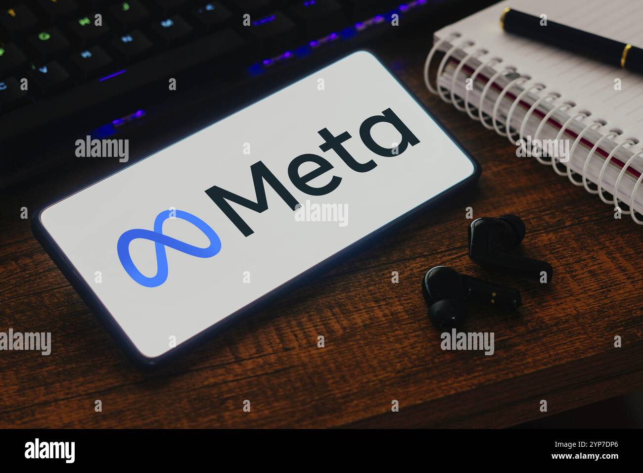 In this photo illustration, the Meta Platforms logo is displayed on a ...