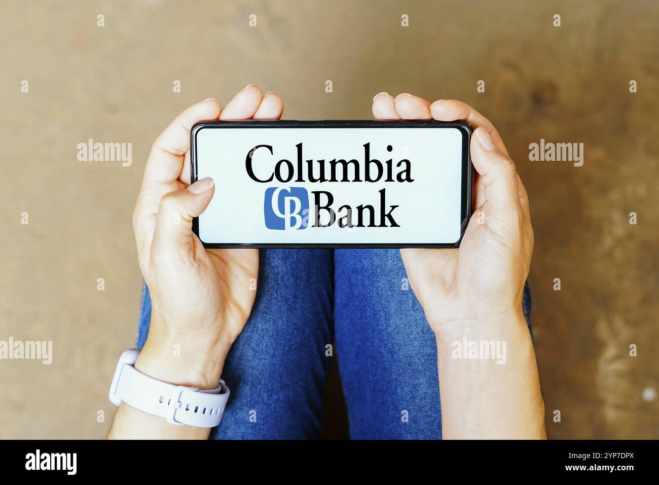 In this photo illustration, the Columbia Banking System logo seen ...