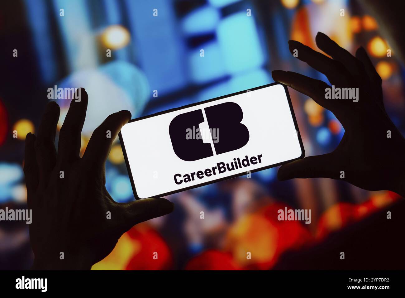 In this photo illustration, the Career Builder logo is displayed on a ...