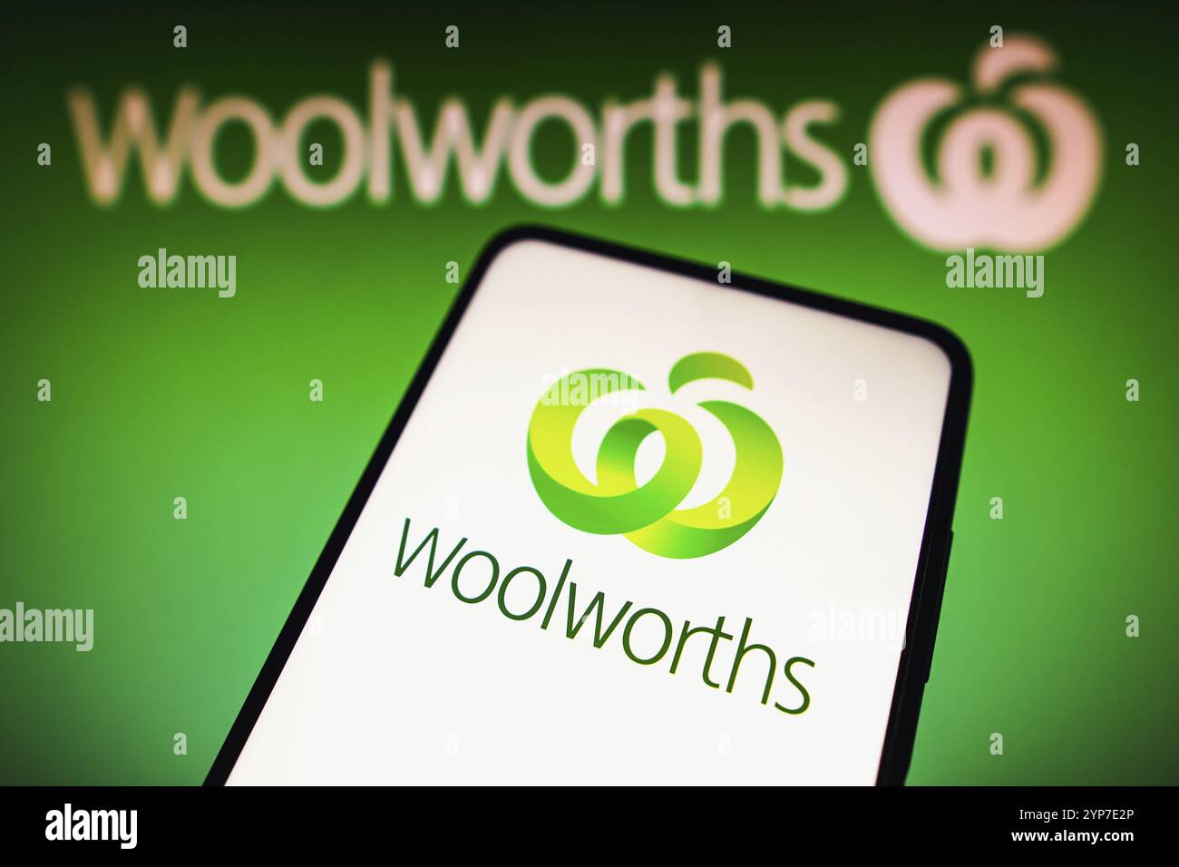 In this photo illustration the Woolworths Supermarkets logo seen ...