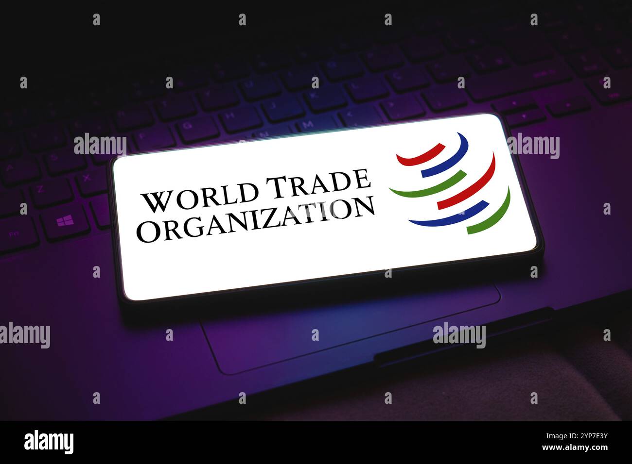 In this photo illustration, the World Trade Organization (WTO) logo is ...