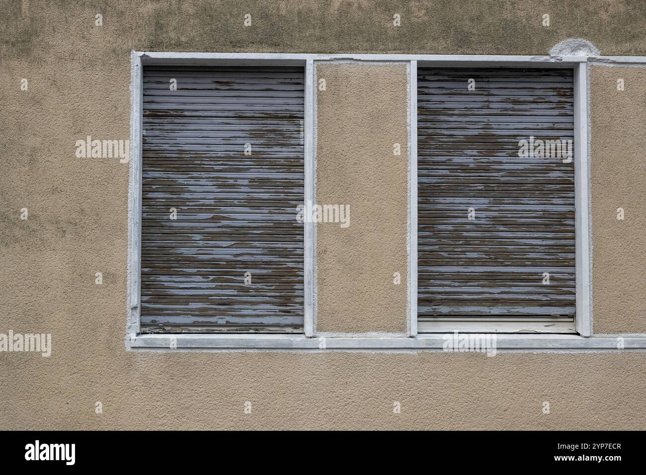 Old roller shutters lowered in a window Stock Photo - Alamy