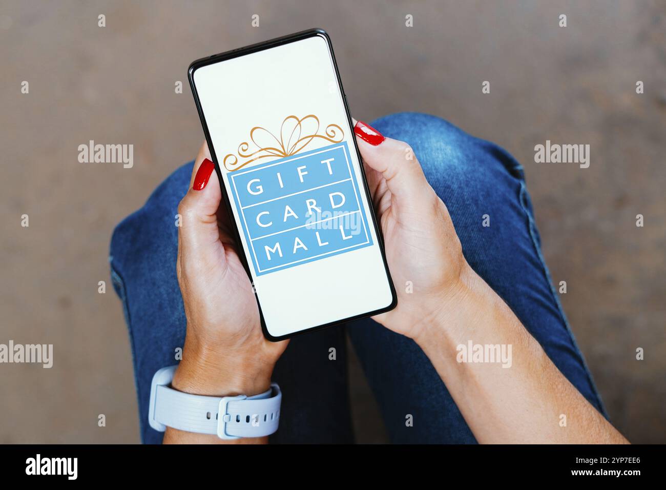 In this photo illustration, the Gift Card Mall logo is displayed on a ...