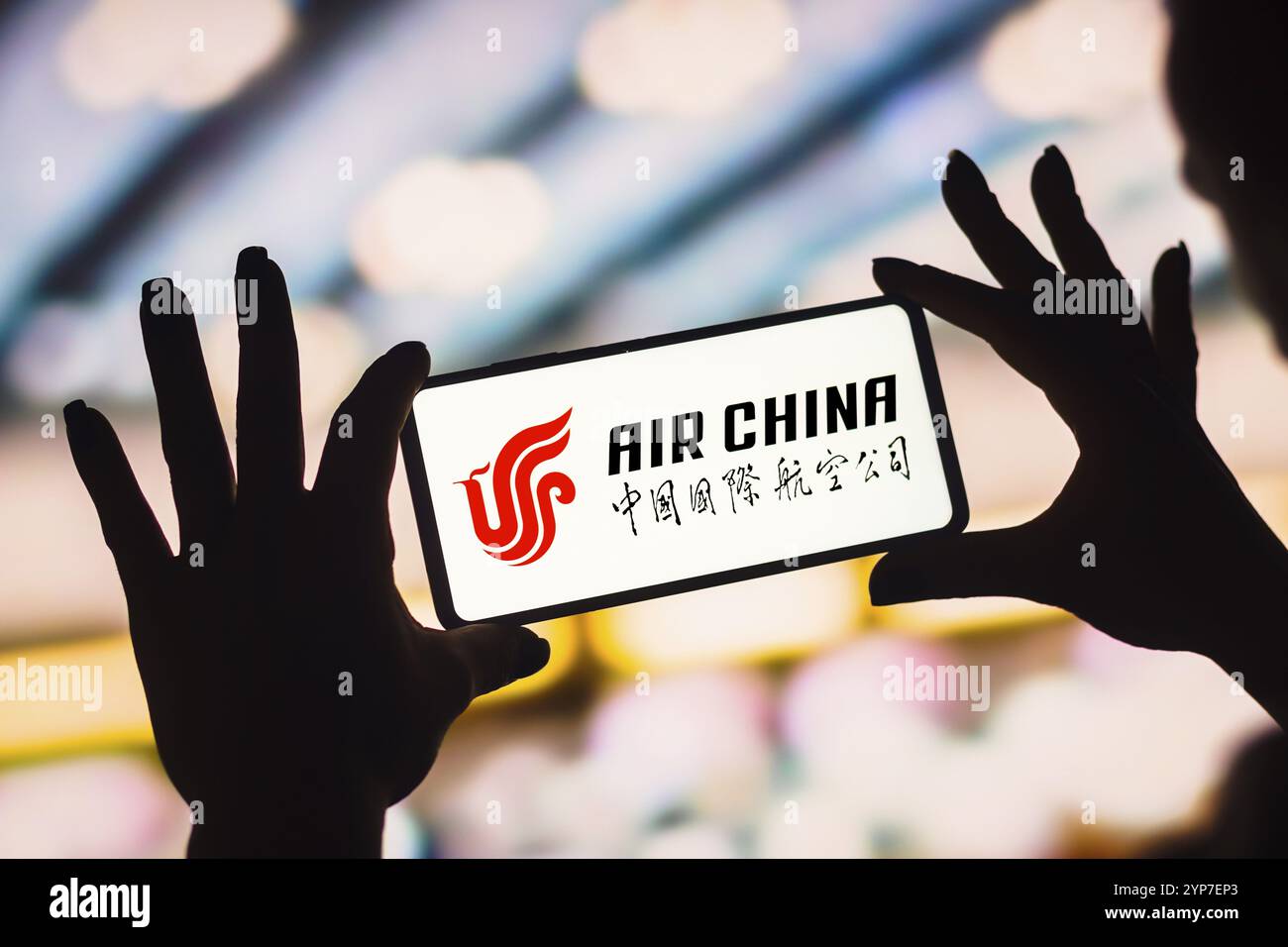 In this photo illustration, the Air China logo is displayed on a ...