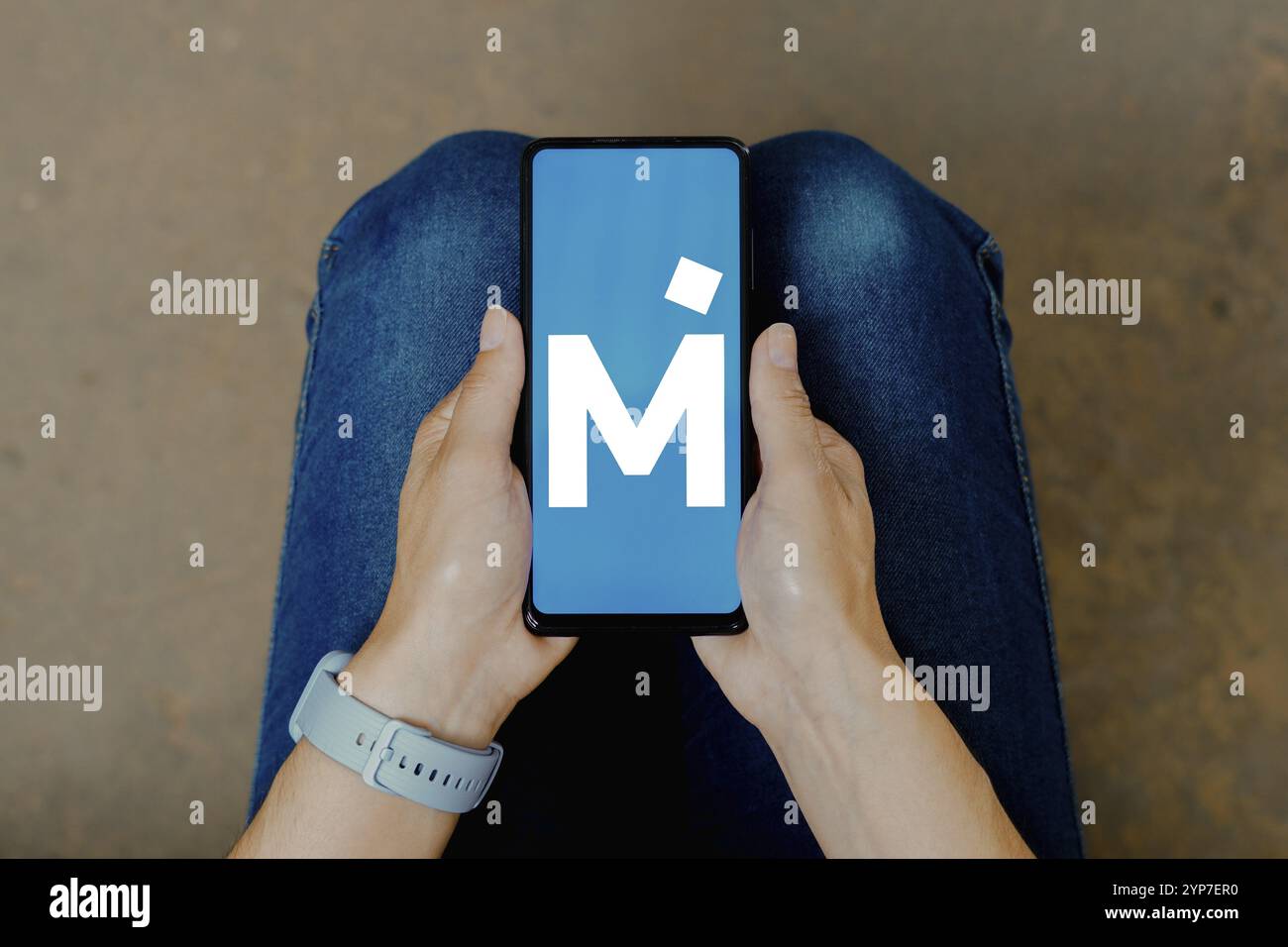 In this photo illustration, the Mercari logo is displayed on a ...