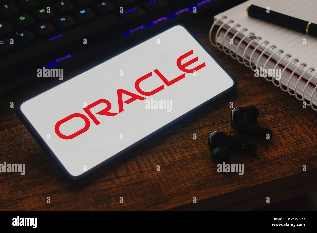 In this photo illustration, the Oracle logo is displayed on a ...