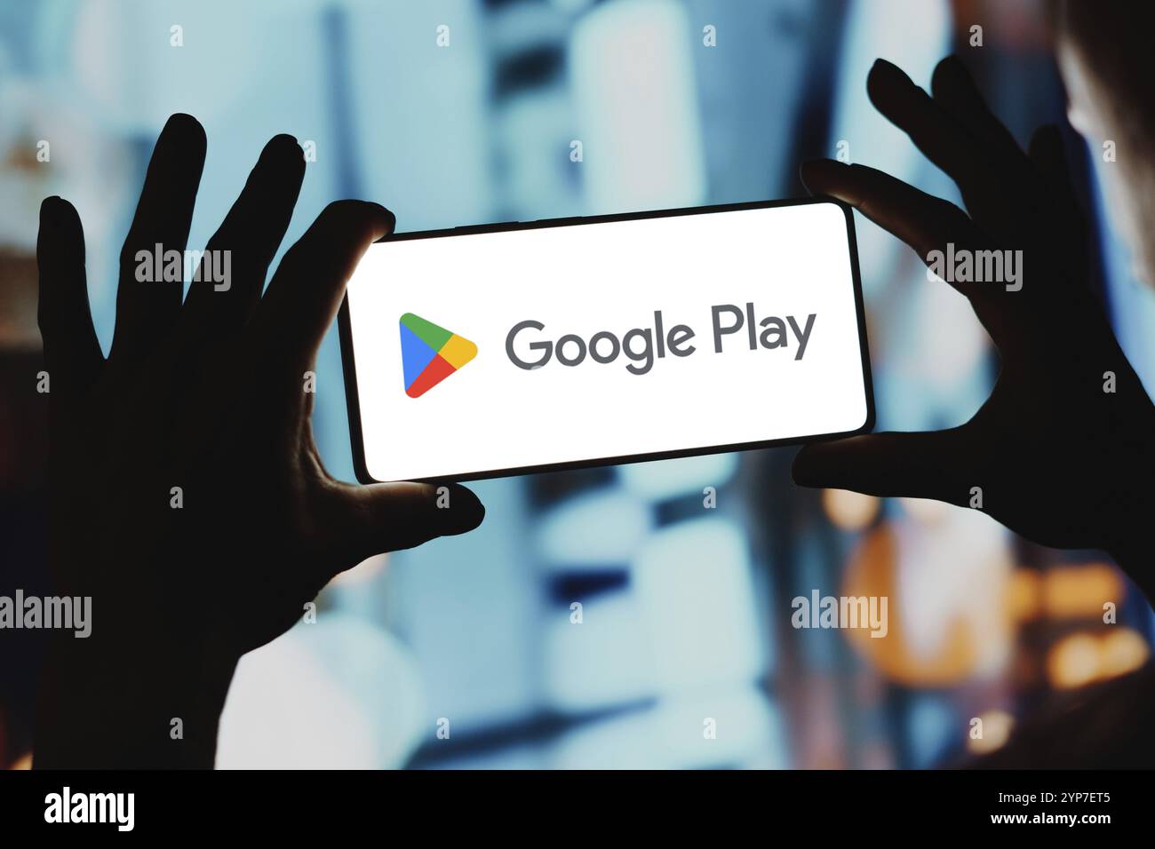 In this photo illustration, the Google Play logo is displayed on a ...