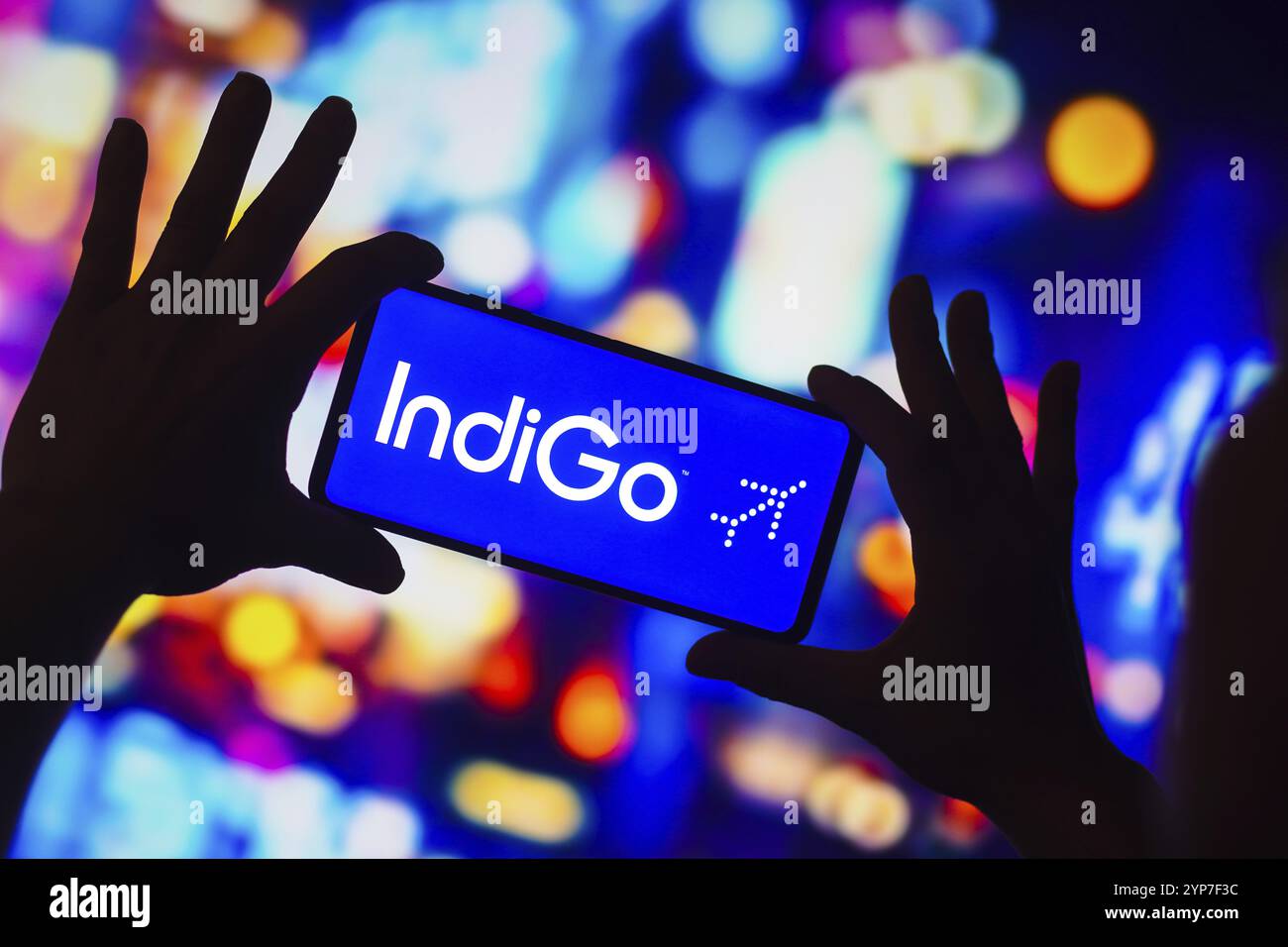 In this photo illustration, the IndiGo Airlines logo is displayed on a ...