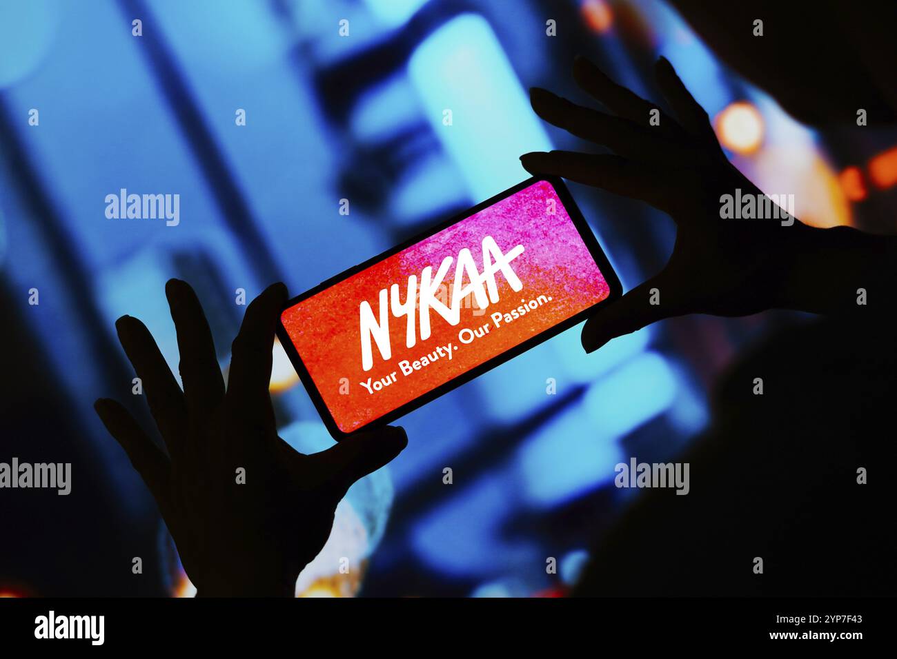 In this photo illustration, the Nykaa logo seen displayed on a ...