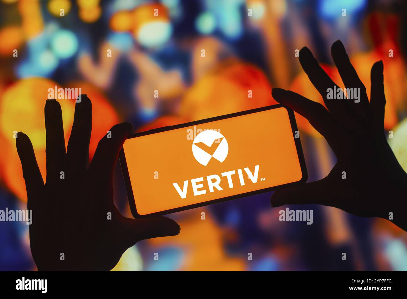 In this photo illustration, the Vertiv logo is displayed on a ...