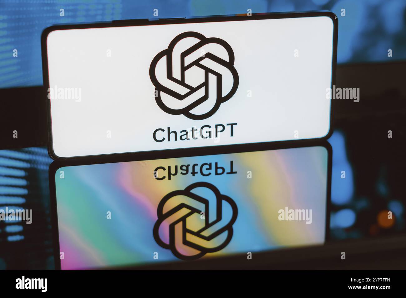 In this photo illustration, the ChatGPT logo is displayed on a ...