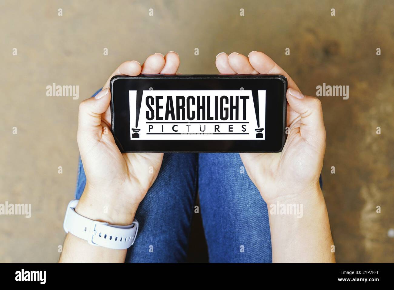 In this photo illustration, the Searchlight Pictures logo seen ...