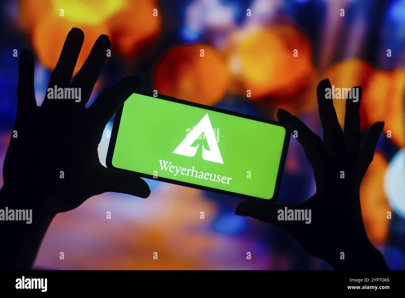 In this photo illustration, the Weyerhaeuser logo is displayed on a ...