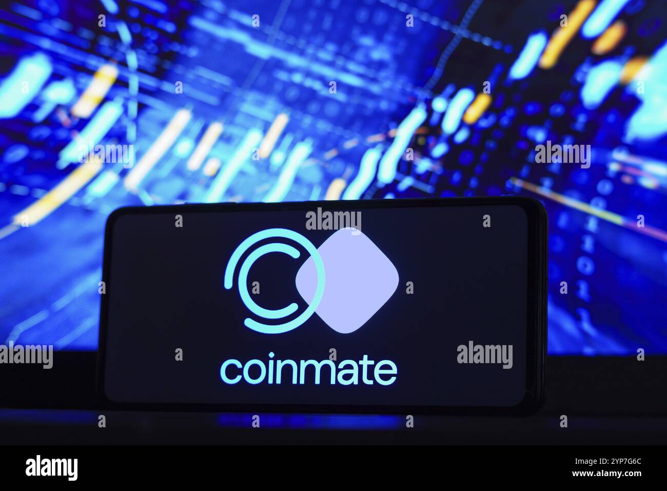 In this photo illustration, the Coinmate logo seen displayed on a ...