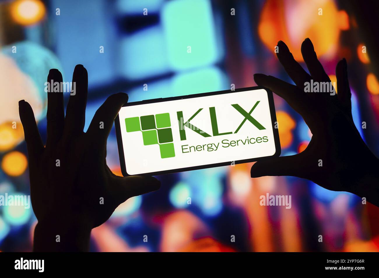 In this photo illustration, the KLX Energy Services logo is displayed on a smartphone screen ...