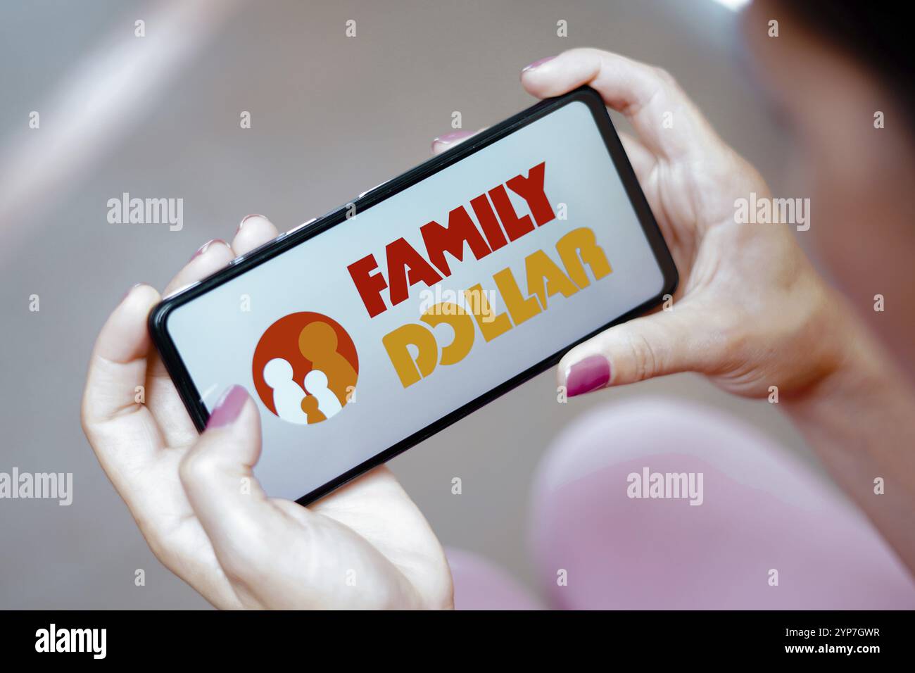 In this photo illustration, the Family Dollar Stores logo app is seen ...