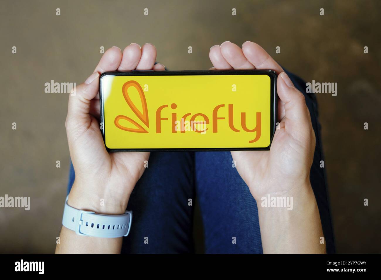 In this photo illustration, the Firefly logo seen displayed on a ...