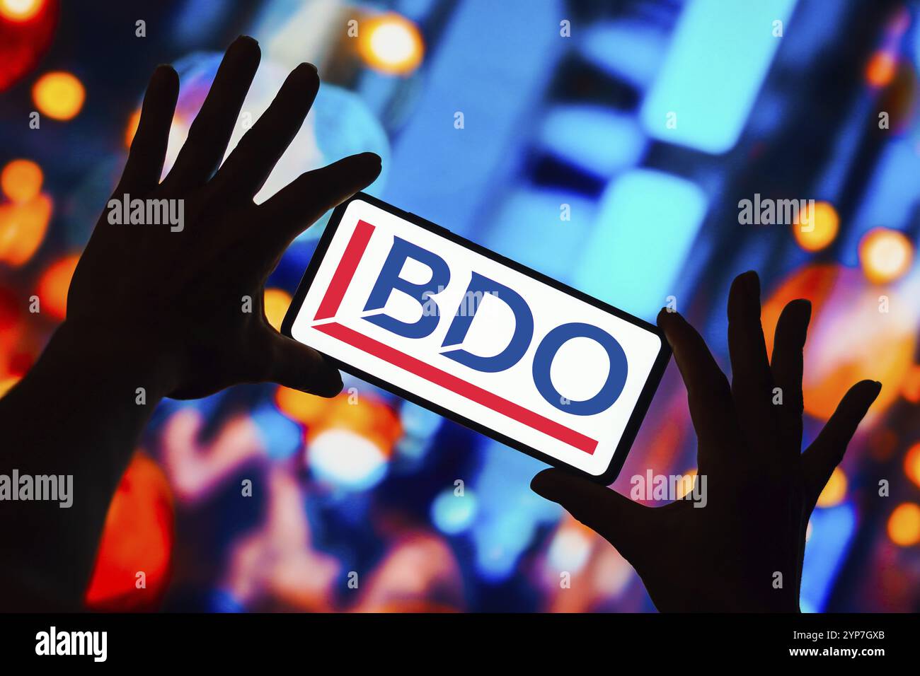 In this photo illustration, the BDO logo is displayed on a smartphone ...