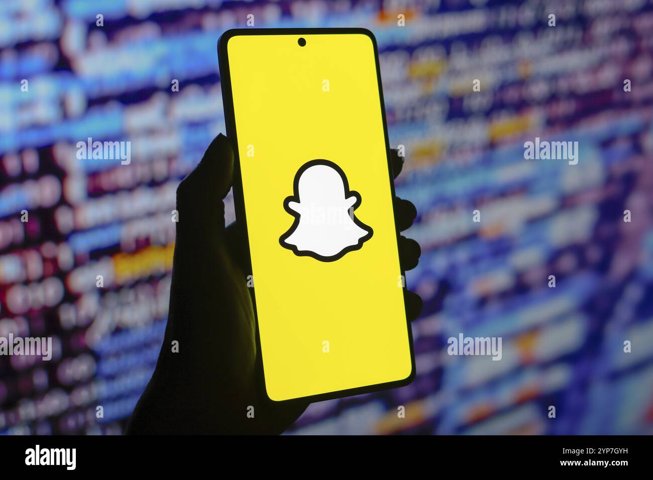 In this photo illustration, the Snapchat logo is displayed on a ...