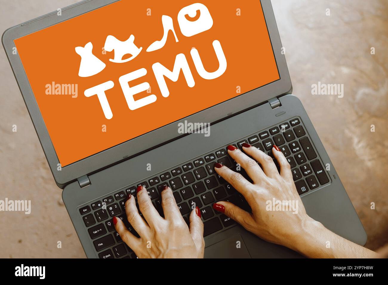 In this photo illustration, the Temu logo is displayed on a laptop ...