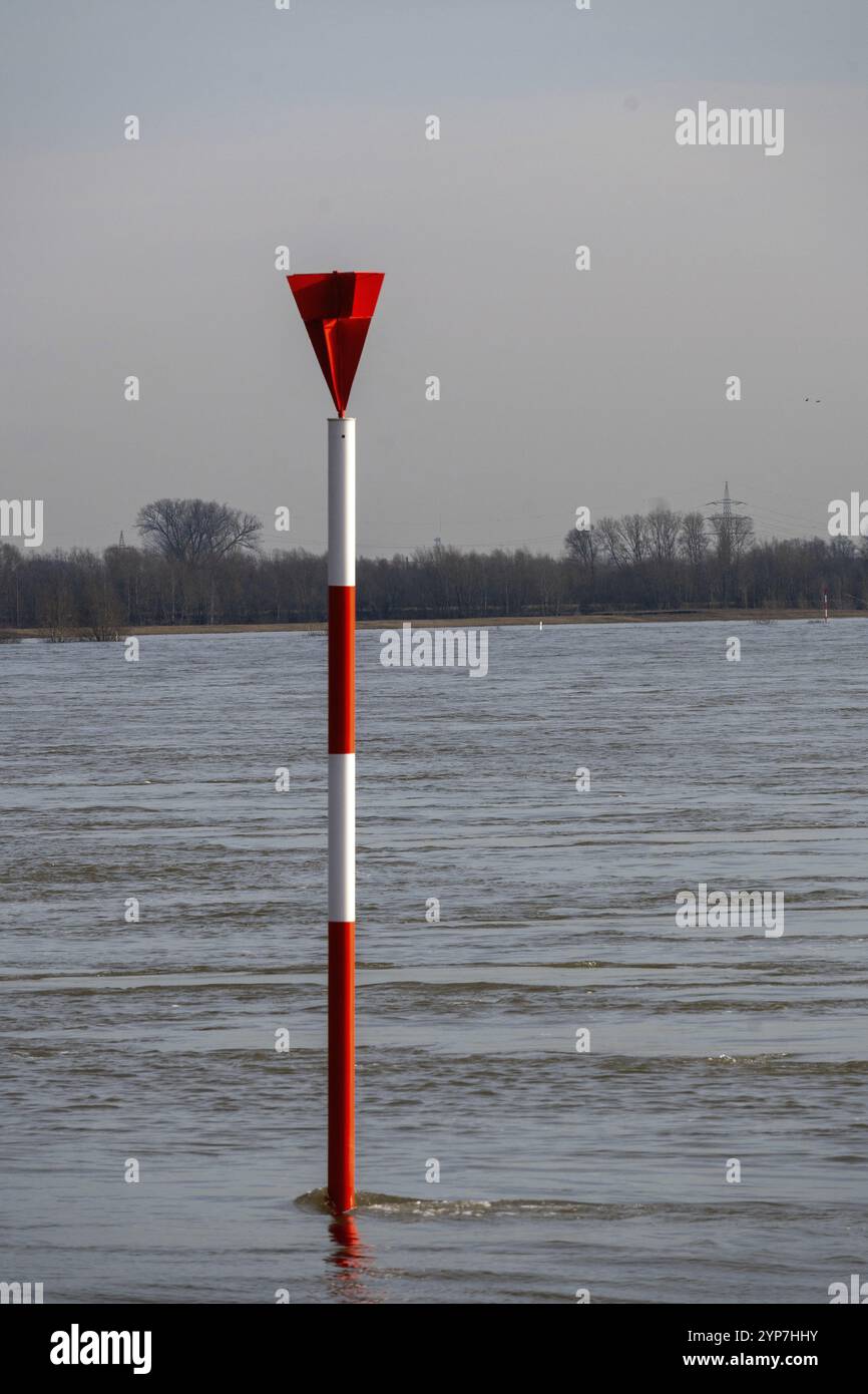The river rhine in germany at high water with red and white markings ...