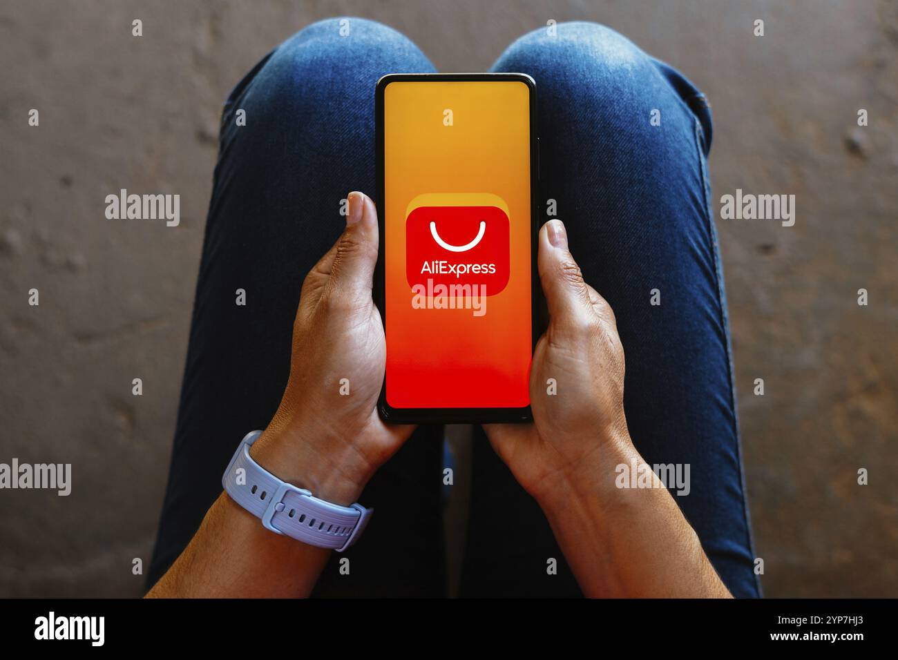 In this photo illustration, the AliExpress logo is displayed on a ...