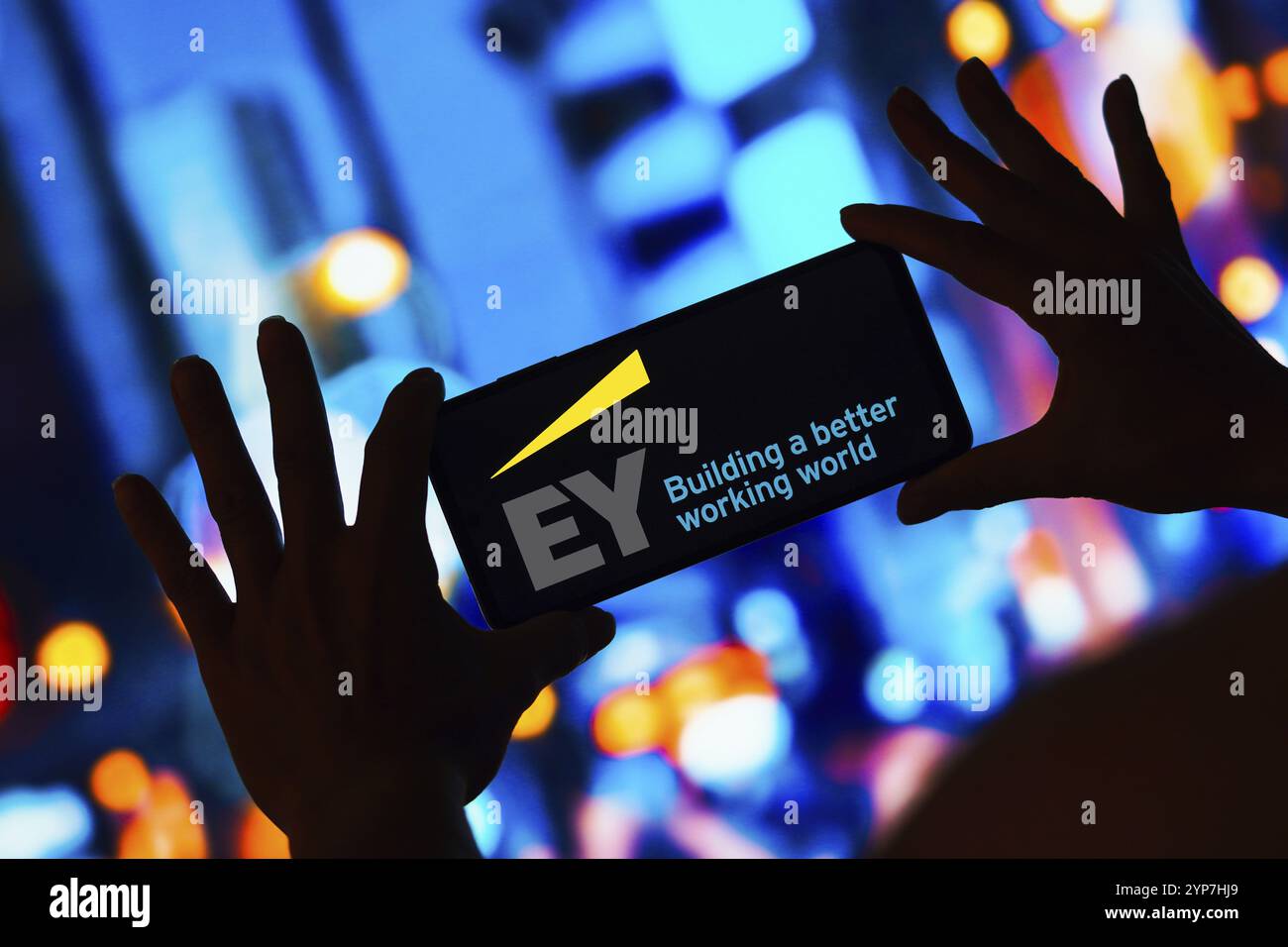 In this photo illustration, the Ernst and Young Global Limited (EY ...