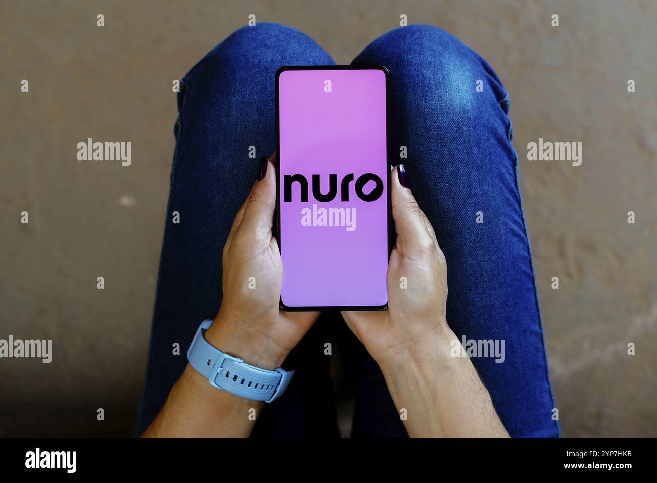 In this photo illustration, the Nuro logo is displayed on a smartphone ...