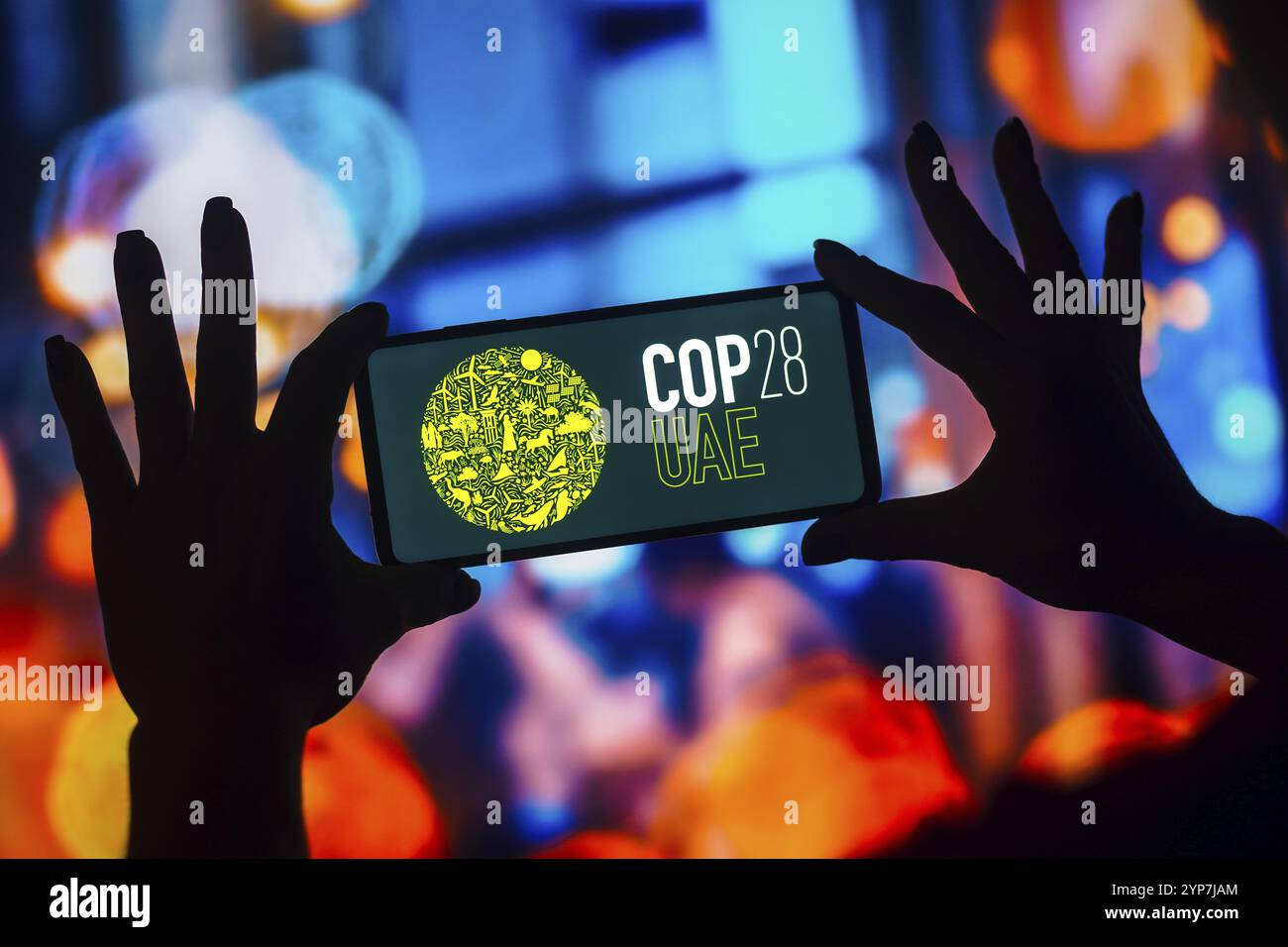 In this photo illustration, the 2023 United Nations Climate Change ...