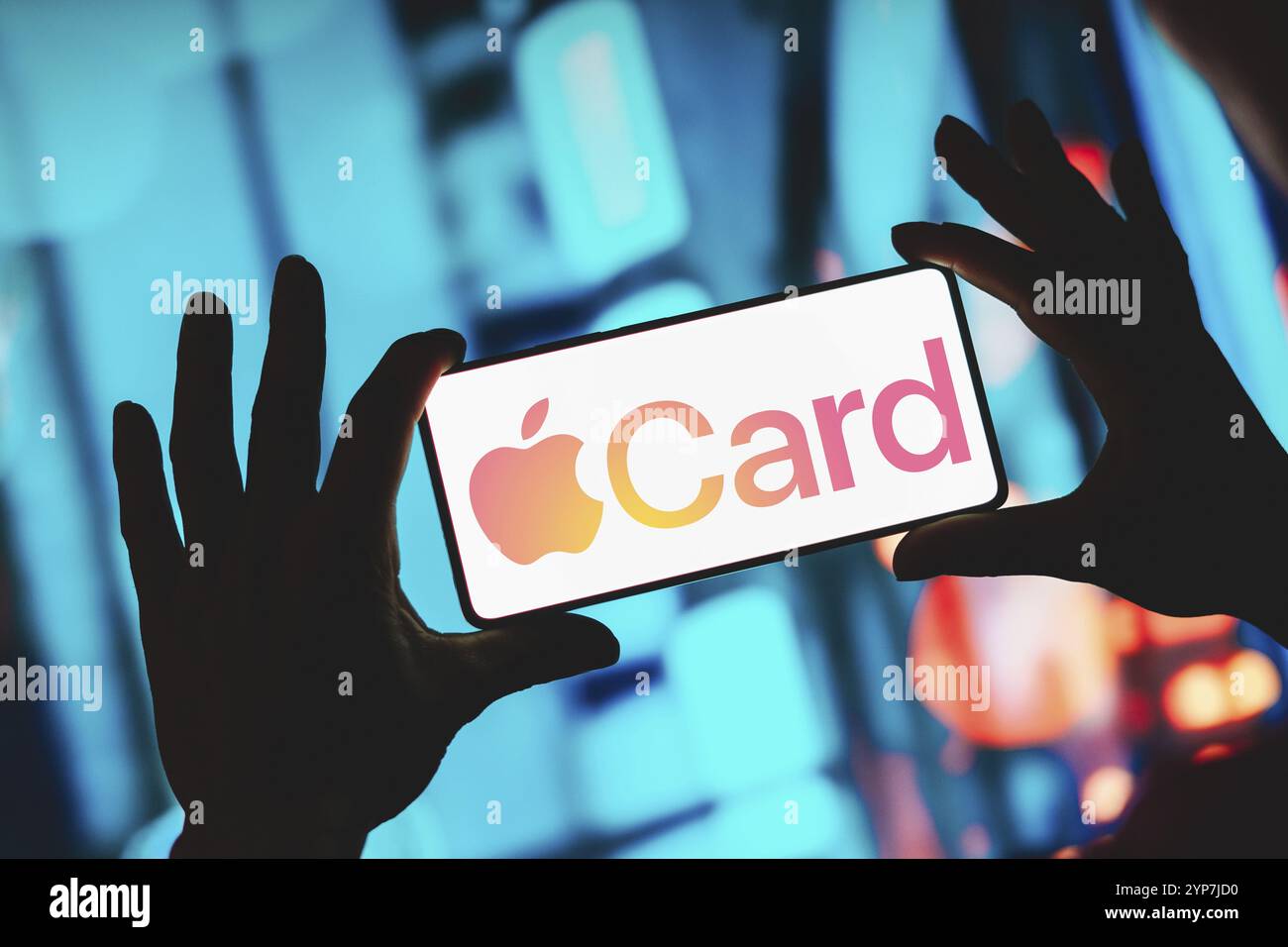 In this photo illustration, the Apple Card logo is displayed on a ...