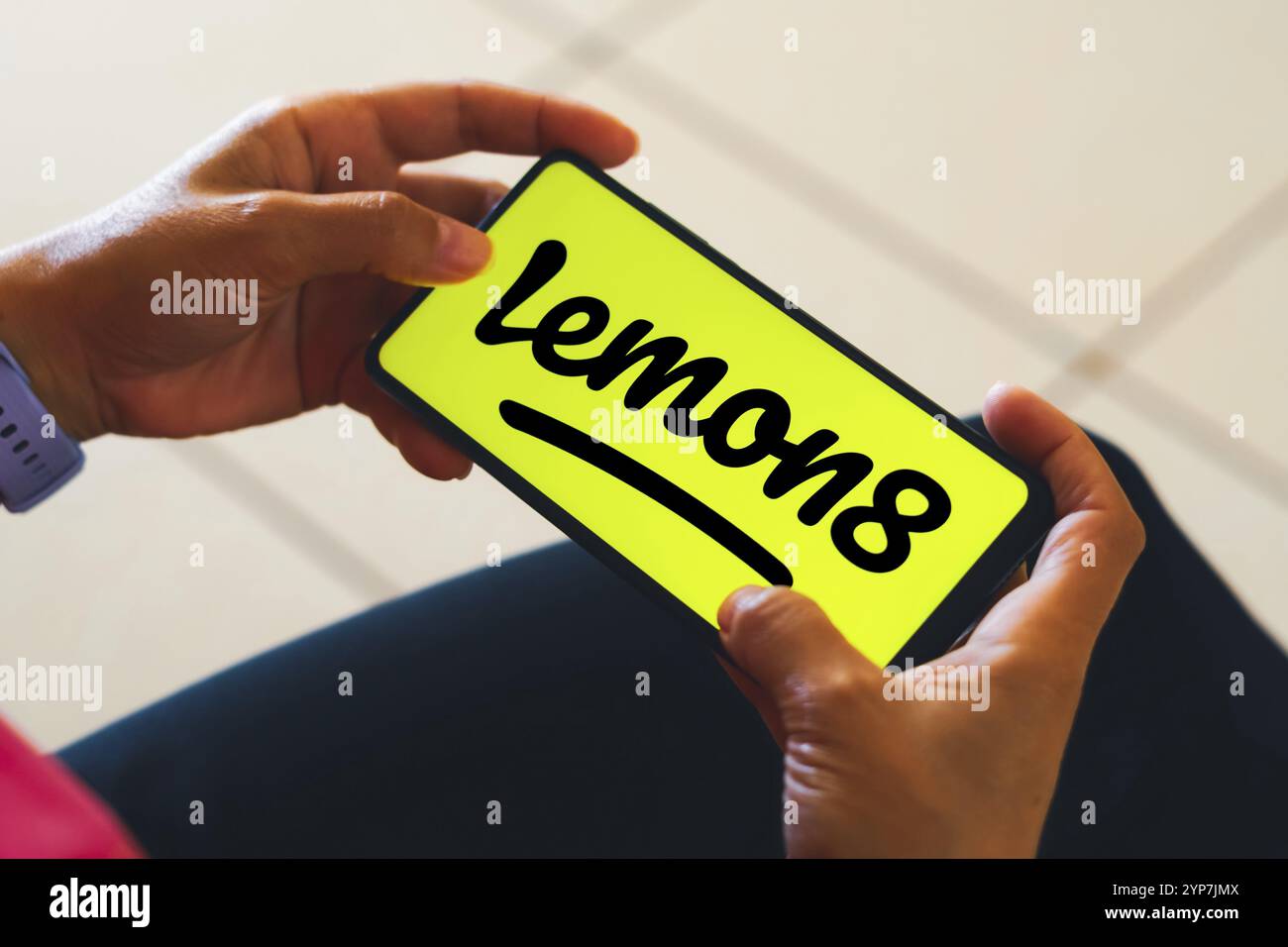 In this photo illustration, the Lemon8 logo is displayed on a smartphone screen Stock Photo - Alamy