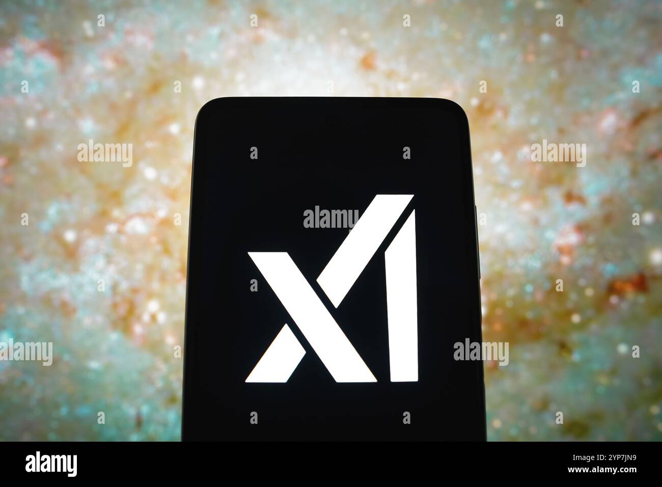 In this photo illustration, the xAI logo seen displayed on a smartphone ...