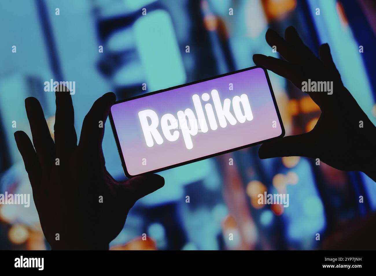 In this photo illustration, the Replika logo is displayed on a ...