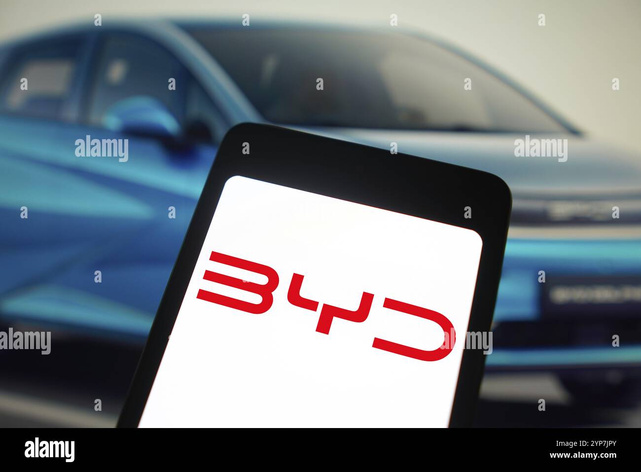 In this photo illustration, the BYD Auto logo is displayed on a ...