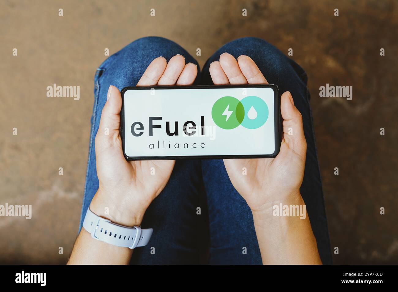 In this photo illustration, the eFuel Alliance logo is displayed on a smartphone screen Stock ...