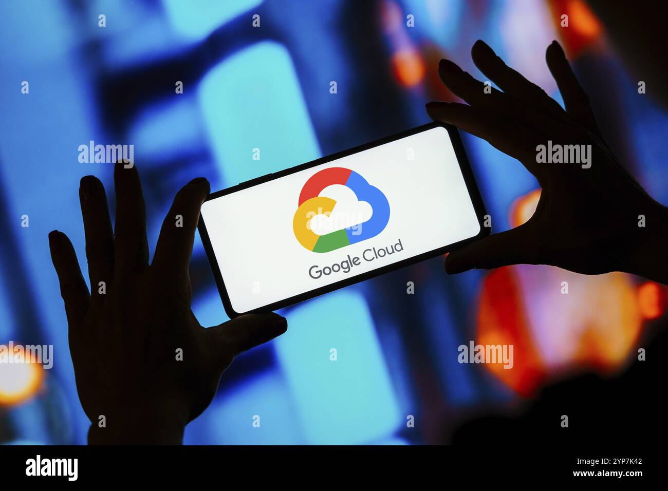 In this photo illustration, the Google Cloud logo seen displayed on a ...