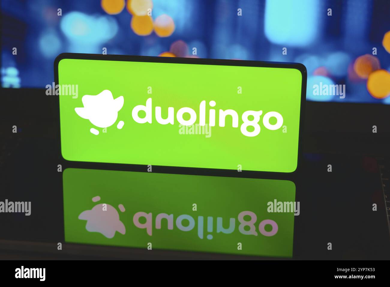 In this photo illustration, the Duolingo logo is displayed on a ...