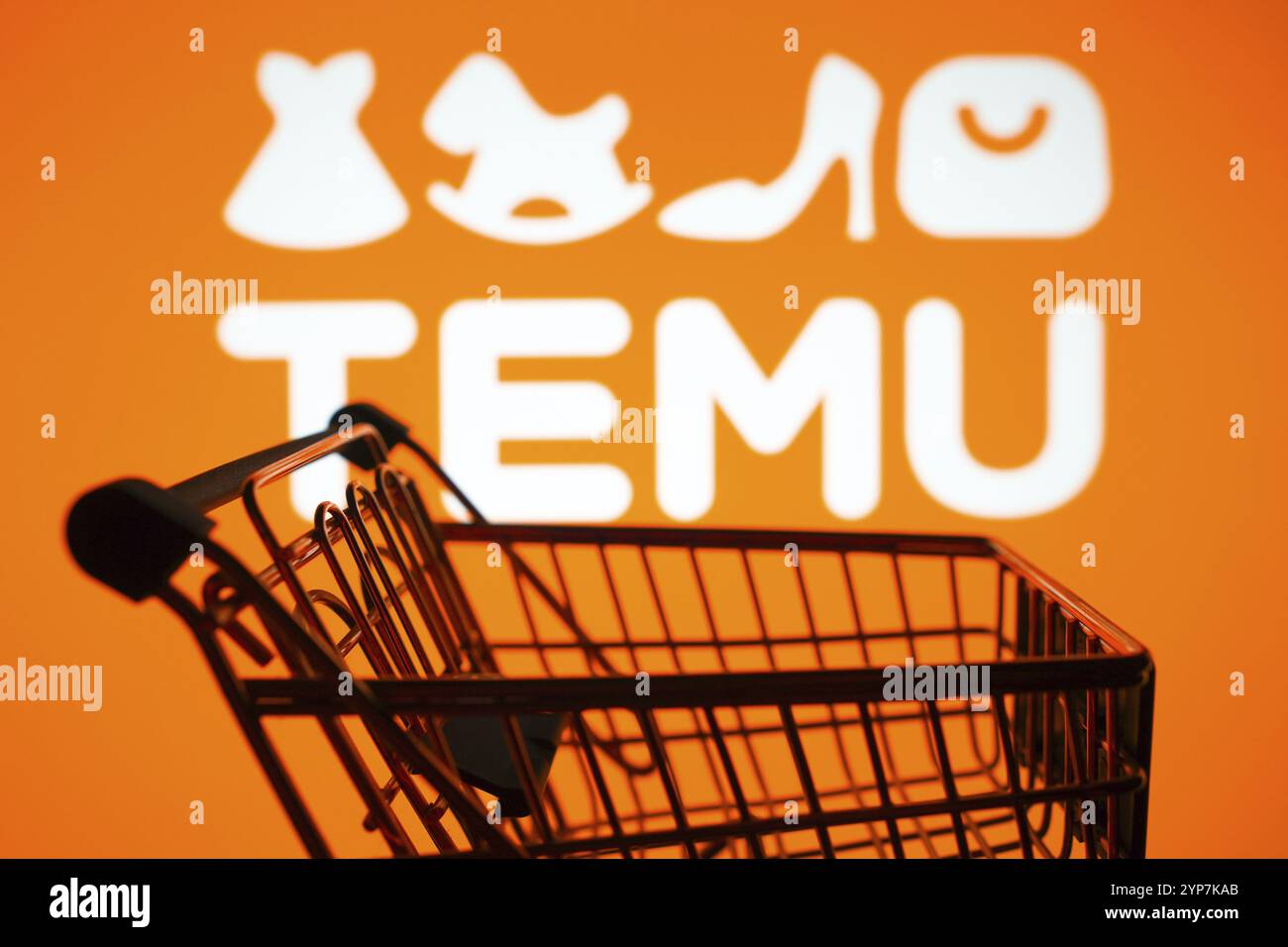 In this photo illustration, the Temu logo seen displayed on a ...