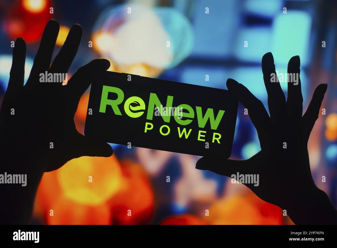 In this photo illustration, the ReNew Power logo is displayed on a ...
