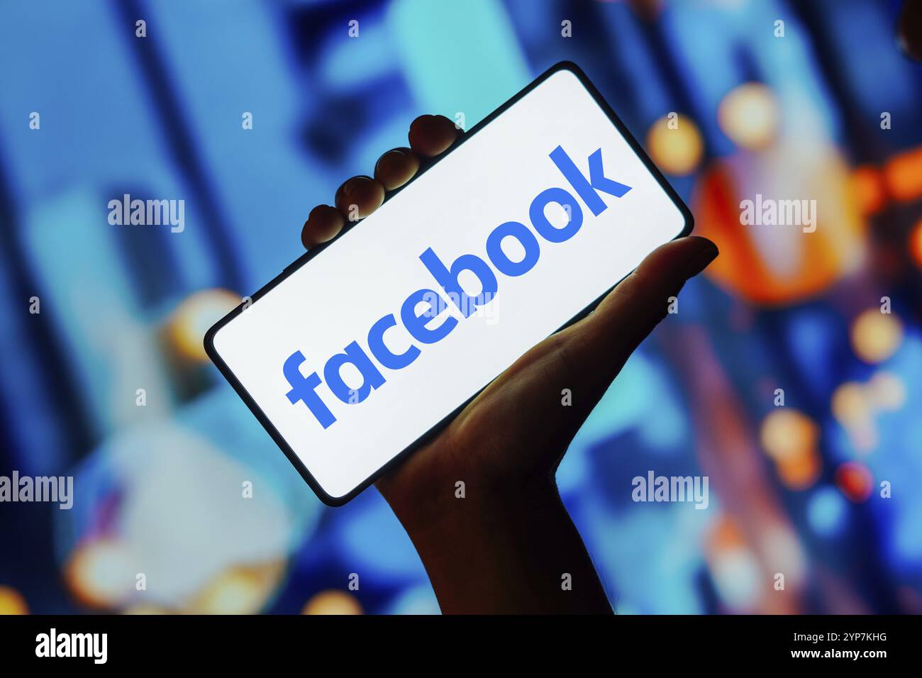 In this photo illustration, the Facebook logo is displayed on a ...