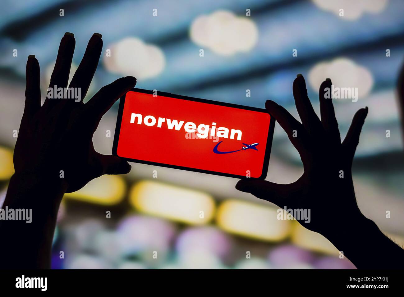 In this photo illustration, the Norwegian Air Shuttle logo is displayed ...