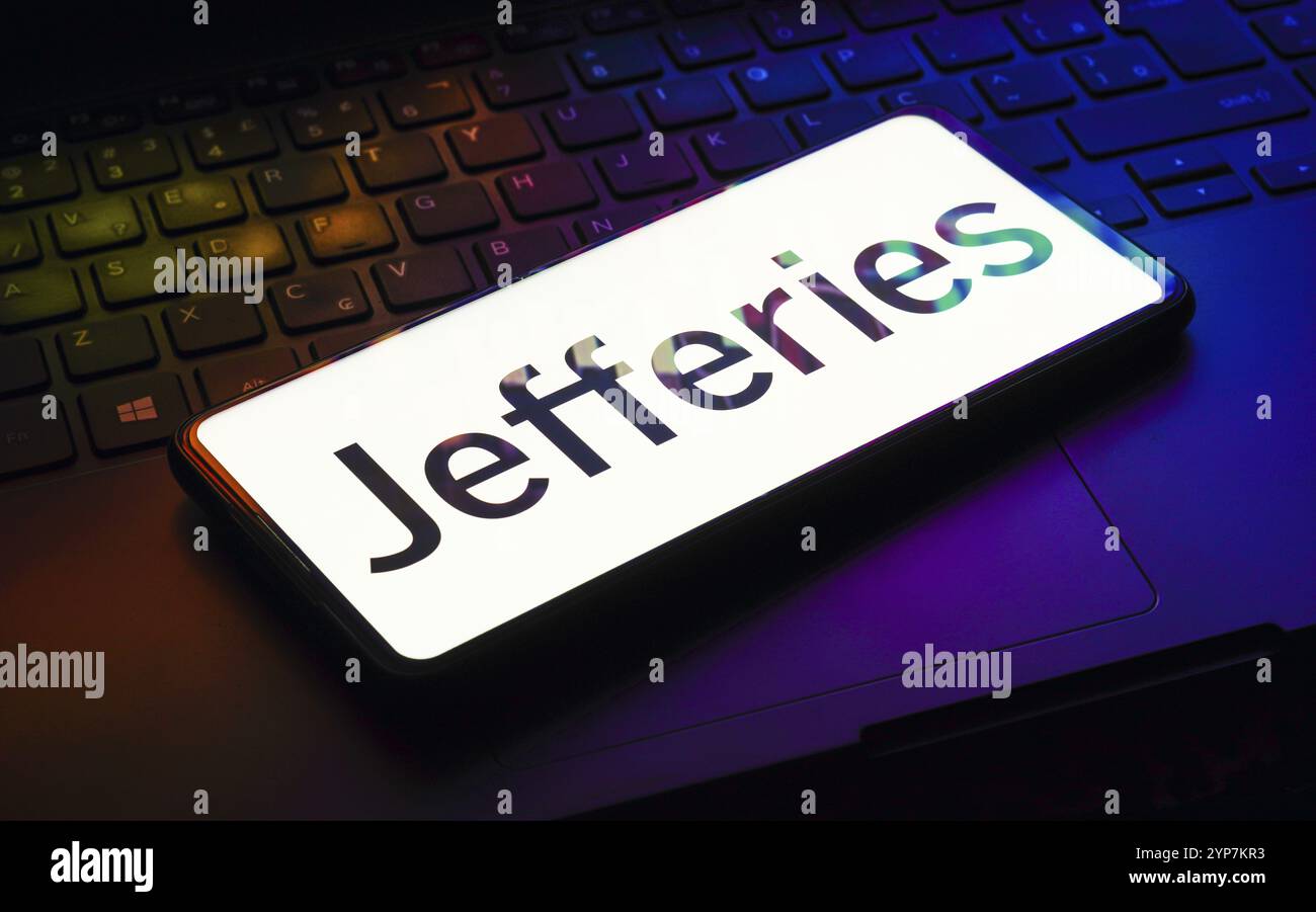 In this photo illustration the Jefferies Group logo seen displayed on a ...