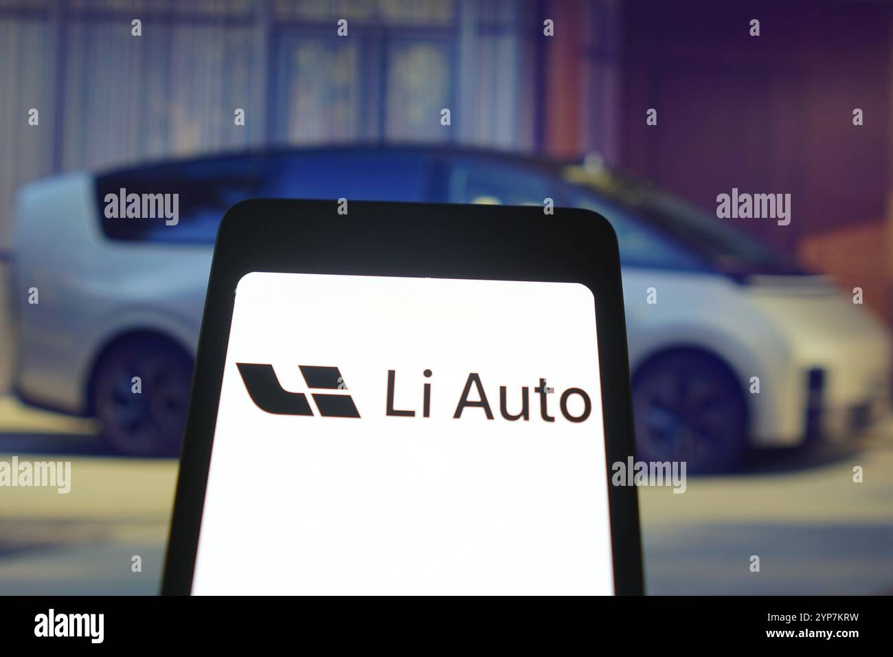 In this photo illustration, the Li Auto logo is displayed on a ...