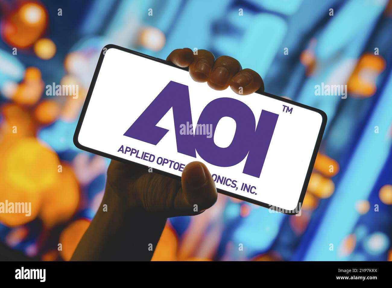(AOI) logo is displayed on a smartphone screen Stock Photo - Alamy