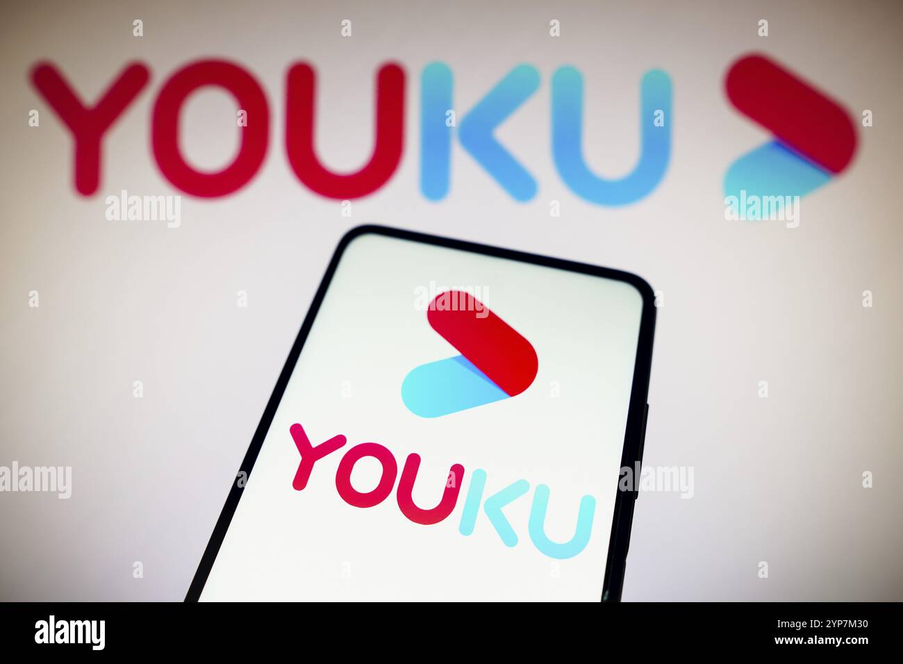 In this photo illustration, the Youku logo is displayed on a smartphone ...