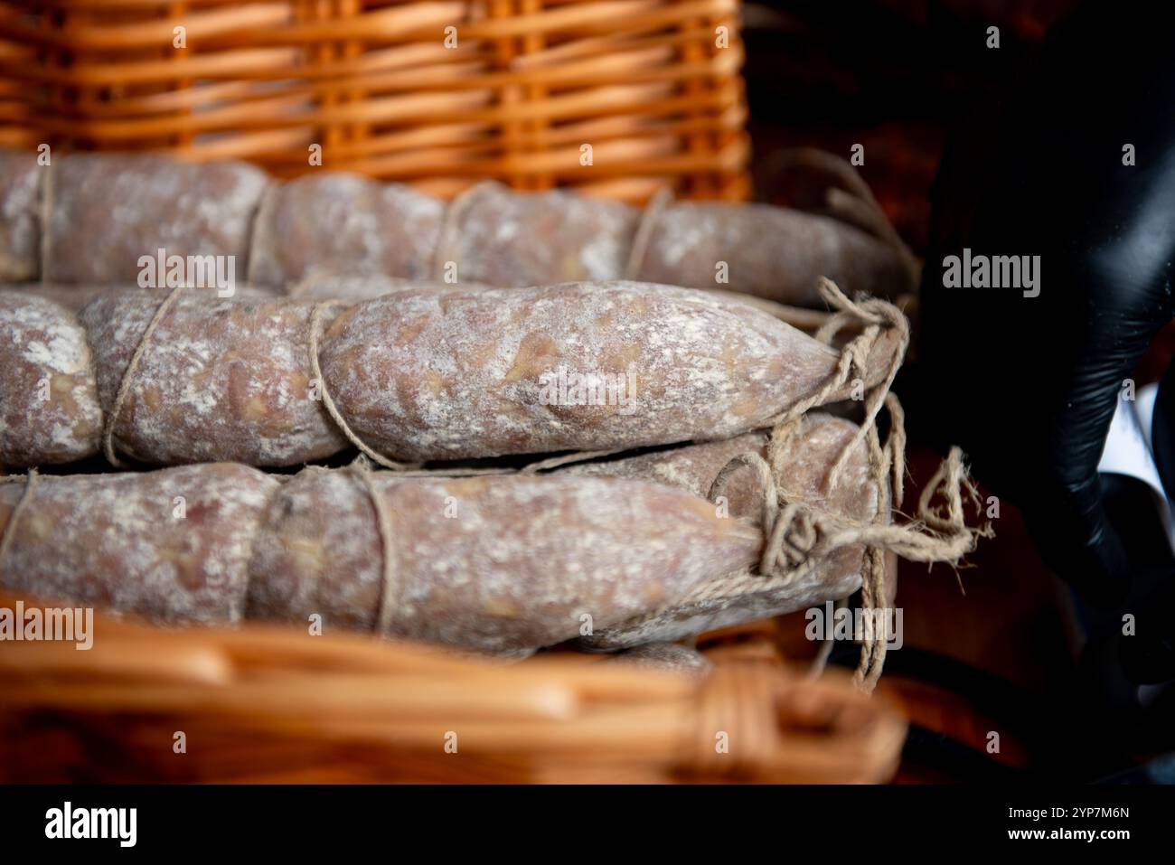 traditional spanish salami or dry sausage covered ,fermented mold in a ...