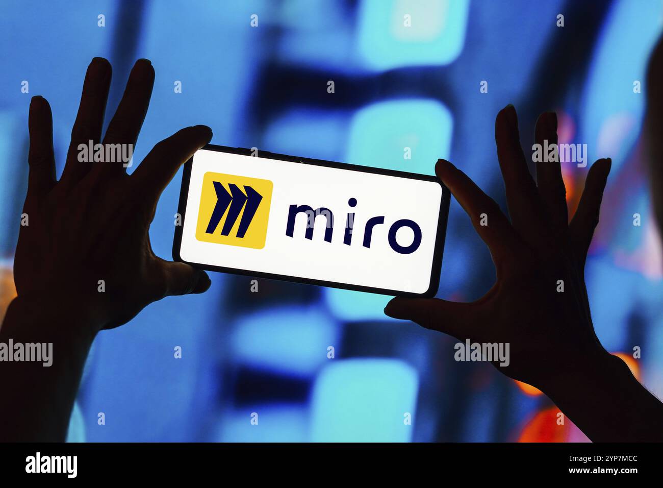 In this photo illustration, the Miro logo seen displayed on a ...