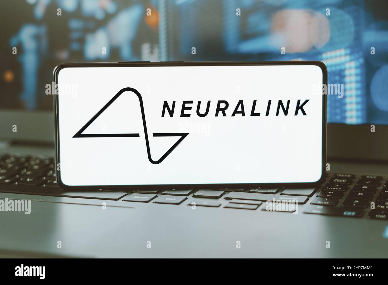 In this photo illustration, the Neuralink logo is displayed on a ...