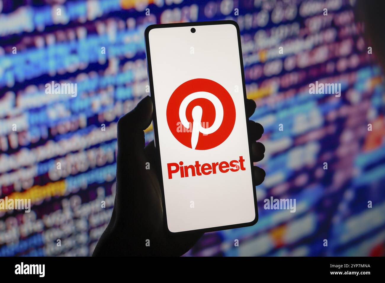 In this photo illustration, the Pinterest logo is displayed on a ...